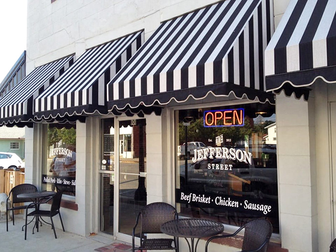 The classic black exterior with striped awnings isn't just charming—it's a beacon calling to barbecue pilgrims from across Indiana. Small-town magic with big-time flavor.