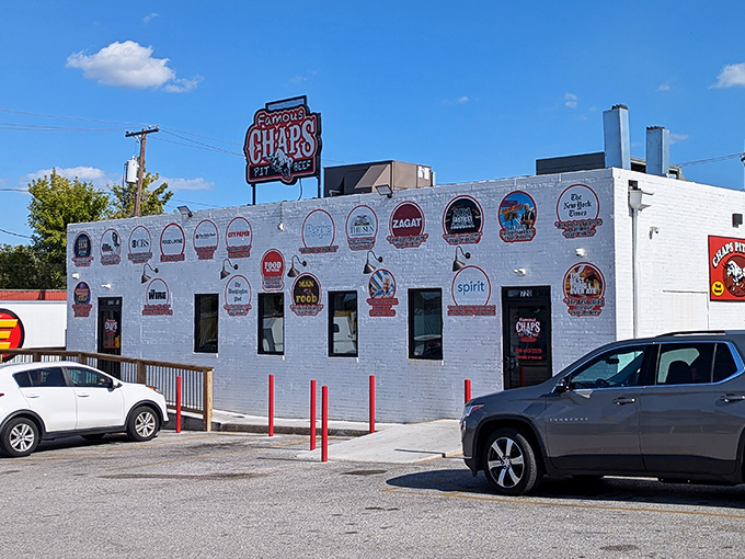 The unassuming exterior of Chaps Pit Beef stands like a beacon for barbecue pilgrims. The cartoon sign reminds you this is a destination worth driving to.