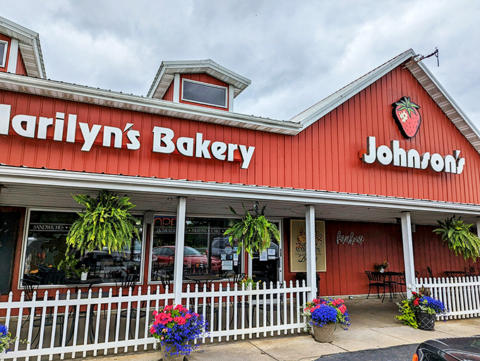 The red barn exterior of Marilyn's isn't just charming—it's a beacon of hope for those who believe butter makes everything better. Fall decorations complete the Hoosier welcome.