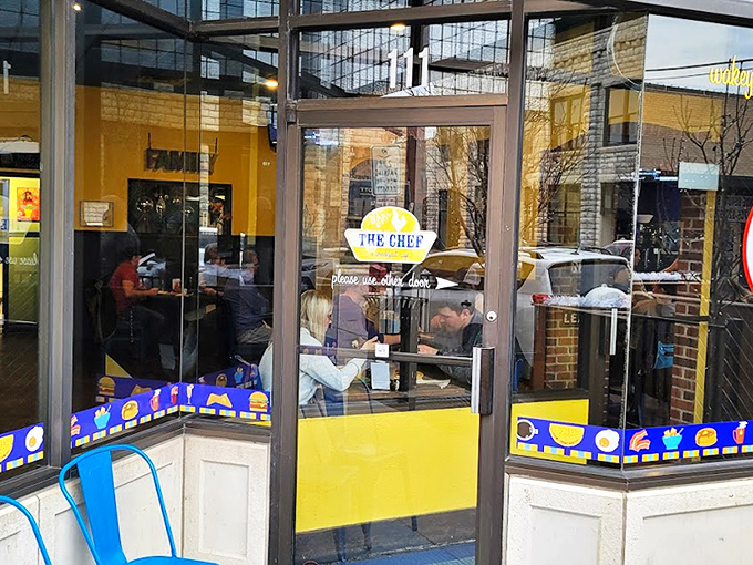 The limestone facade of The Chef welcomes hungry patrons with its cheerful egg-shaped "Open" sign—a promise of good things to come inside.