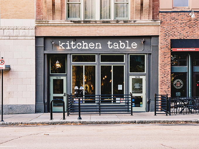 The unassuming storefront belies the culinary treasures within. Like finding a secret jazz club, Kitchen Table's exterior promises those in-the-know something special awaits.