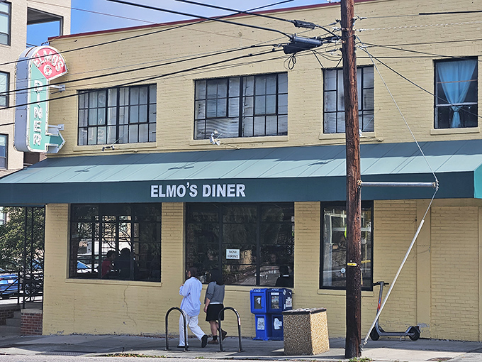 The unassuming exterior of Elmo's Diner in Durham stands like a culinary lighthouse, promising comfort and satisfaction without any unnecessary fuss.