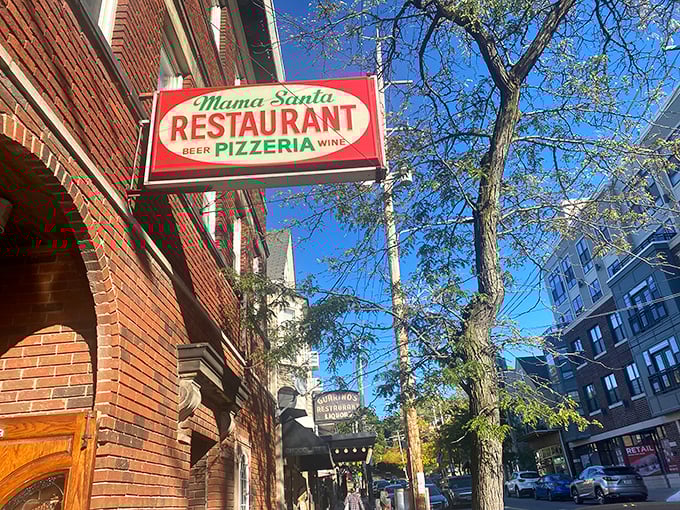 The unassuming brick corner that houses pizza paradise. Like Clark Kent's glasses, this modest exterior hides superhero-level Italian food inside.