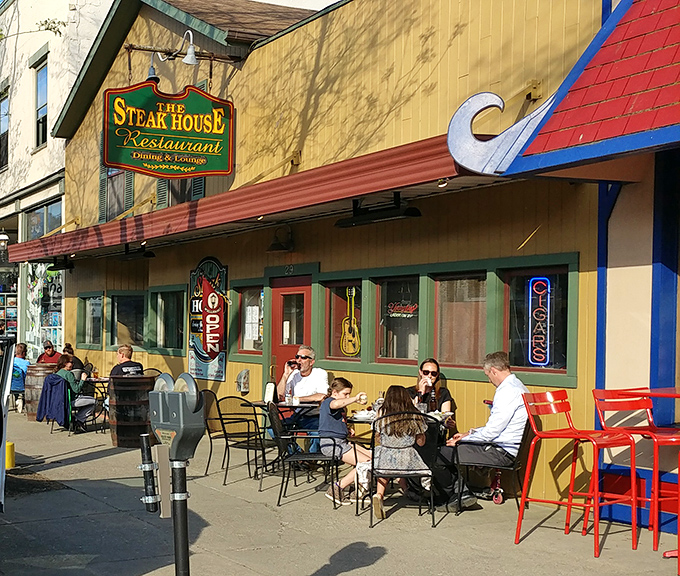 Classic Americana beckons with that iconic green sign promising carnivorous delights. Outdoor tables invite you to people-watch on Wellsboro's charming Main Street.