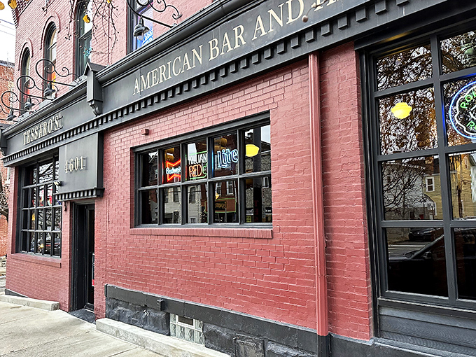 The brick facade of Tessaro's glows like a beacon for burger lovers, its neon signs promising cold beer and hot grills inside. 