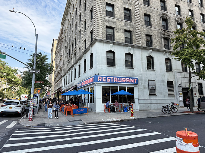The iconic red "RESTAURANT" sign has welcomed hungry New Yorkers for decades—and yes, Seinfeld fans will recognize it instantly.