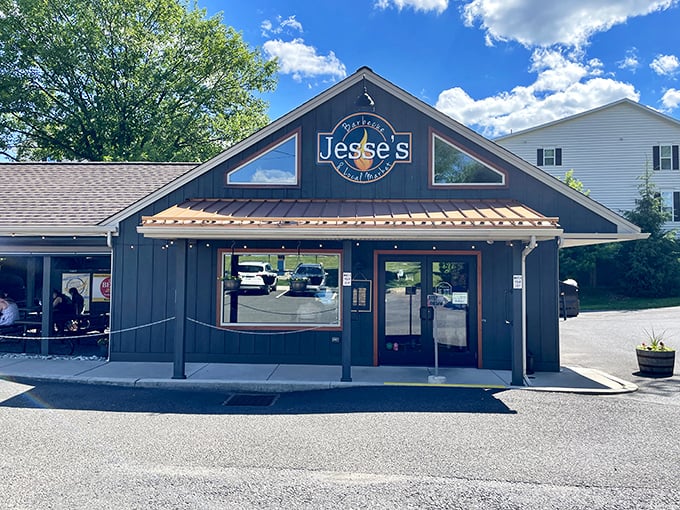 The barbecue promised land beckons with its simple wooden exterior and copper accents—proof that the best smokehouses focus on meat, not architectural flourishes.