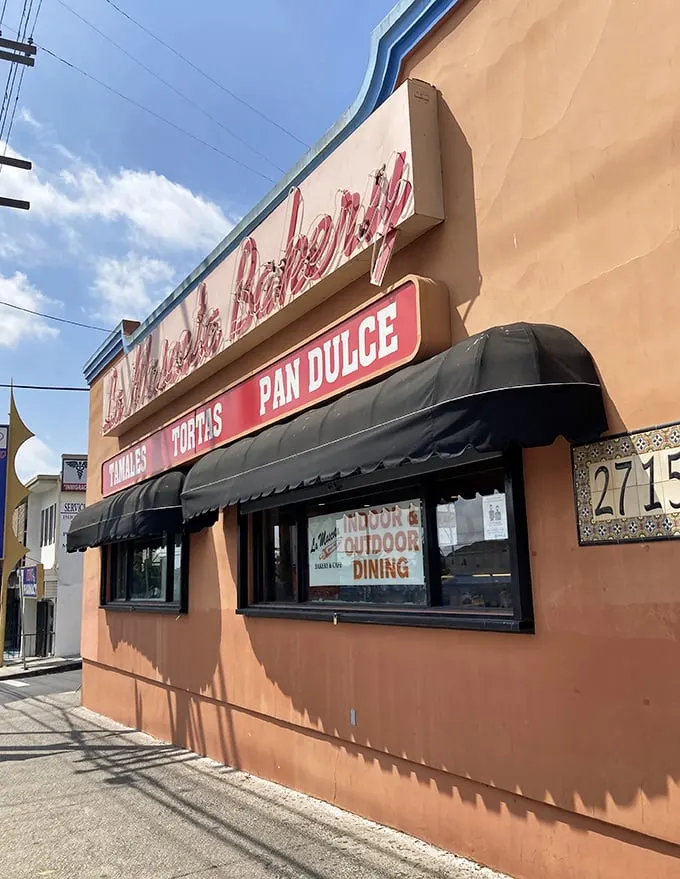 The terracotta-colored exterior of La Mascota stands like a beacon of culinary promise on a Boyle Heights corner, its vintage signage proudly announcing the treasures within.