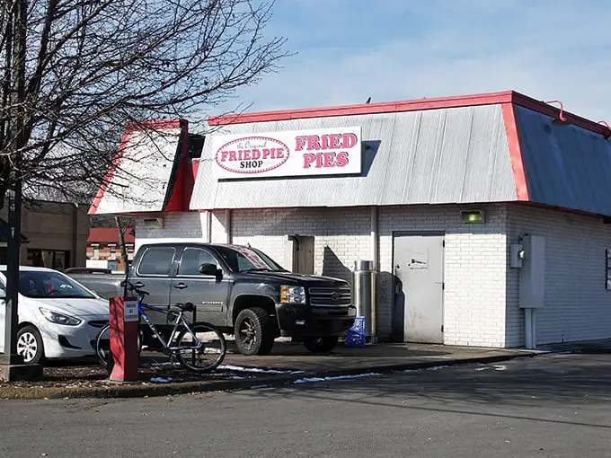 The unassuming exterior hides culinary treasures like a poker player conceals a royal flush. This modest brick building houses hand-held happiness waiting to be discovered.