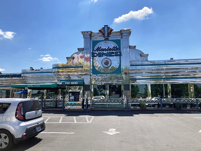 The chrome exterior of Marietta Diner gleams like a beacon of hope for the hungry. This isn't just a restaurant—it's a shining temple of comfort food.