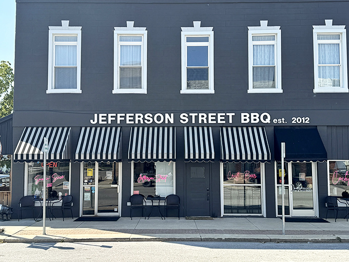 The classic black exterior with striped awnings isn't just charming—it's a beacon calling to barbecue pilgrims from across Indiana. Small-town magic with big-time flavor.