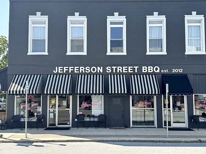 The classic black exterior with striped awnings isn't just charming—it's a beacon calling to barbecue pilgrims from across Indiana. Small-town magic with big-time flavor.