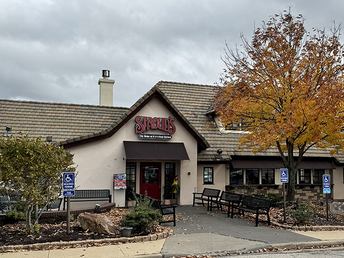 The iconic red doors of Stroud's welcome you like an old friend's embrace – promising comfort and legendary fried chicken inside.