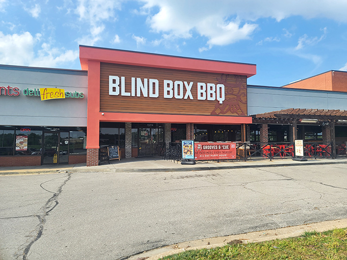 The bright orange facade of Blind Box BBQ stands out like a beacon for hungry barbecue pilgrims. No smoke signals needed—you can smell the goodness from the parking lot.