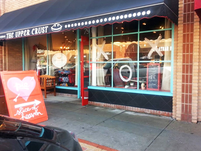The charming storefront beckons like a siren song for pie lovers. That black awning and teal trim practically whisper, "Yes, happiness lives here."