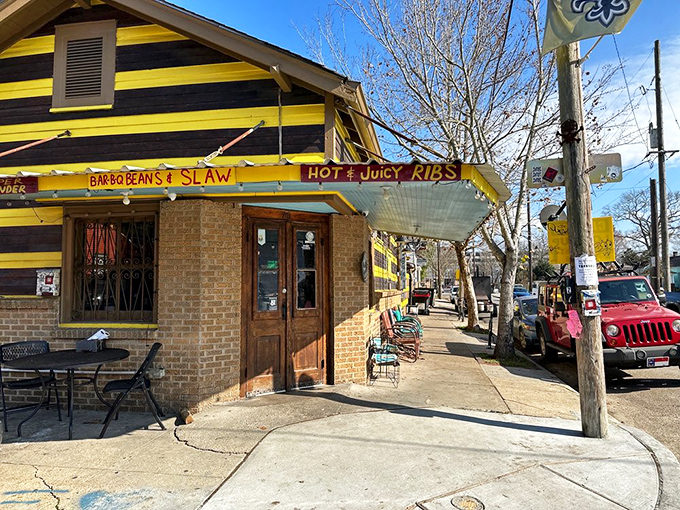 The unmistakable yellow-and-black striped exterior of The Joint beckons like a barbecue lighthouse in New Orleans' Bywater neighborhood. Hot and juicy ribs, indeed!