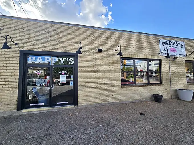The unassuming yellow brick exterior of Pappy's Smokehouse – where BBQ pilgrims willingly make the journey for meat nirvana.