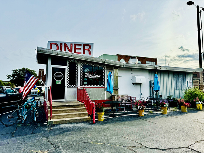 The iconic exterior of Broadway Diner beckons with its retro charm and unmistakable red "DINER" sign—a Columbia landmark where breakfast dreams come true. 