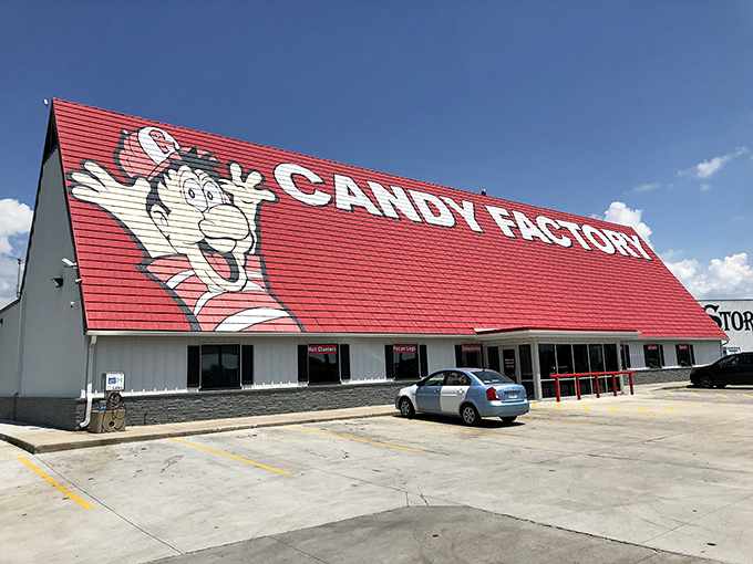 A candy lover's beacon on I-44, Redmon's iconic red roof and cartoon mascot promise sweet salvation just minutes from your sensible driving schedule.