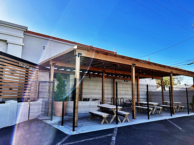 The wooden slat exterior of The Grove isn't just stylish—it's a preview of the warmth waiting inside, like a delicious secret the building can barely contain.
