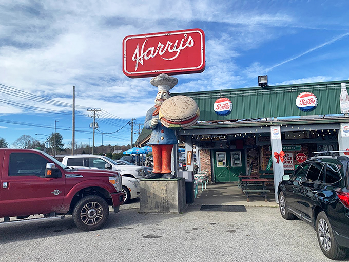 The roadside charm of Harry's comes complete with whimsical statues – including a chef pig holding a burger and that iconic ice cream cone beckoning hungry travelers.