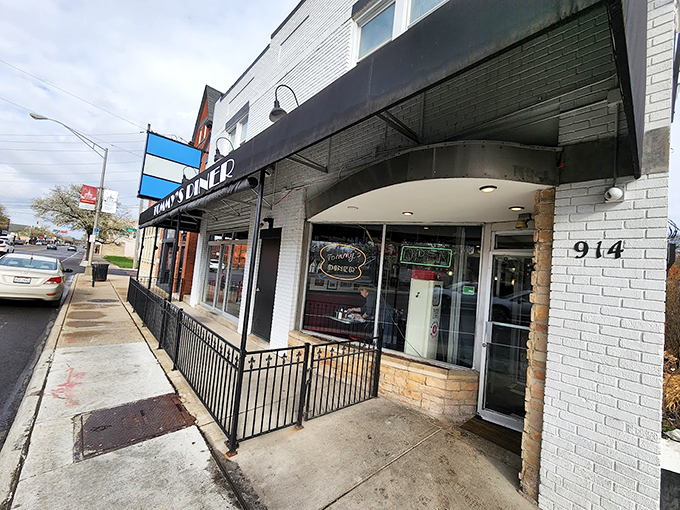 That iconic red and white sign isn't just advertising – it's a time machine promising comfort food and nostalgia at Tommy's Diner in Columbus.