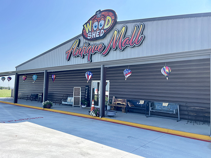 The Woodshed Antique Mall makes quite the first impression with its vibrant signage promising adventures in vintage shopping. Modern meets nostalgic with EV charging available for time travelers.