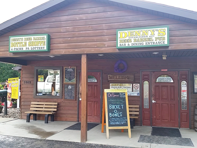 The unassuming wooden exterior of Denny's Beer Barrel Pub – where burger legends are born and diets go to die.
