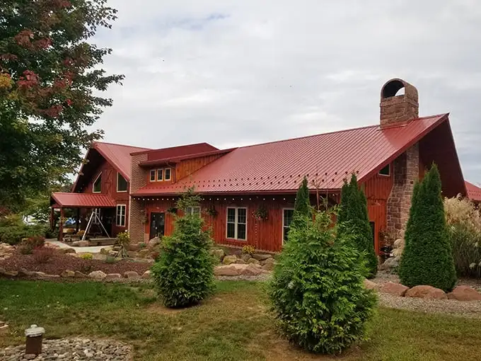 The red-roofed rustic charm of Stampede Barbecue stands like a cathedral to smoked meats, beckoning hungry pilgrims from across Pennsylvania's rolling countryside.