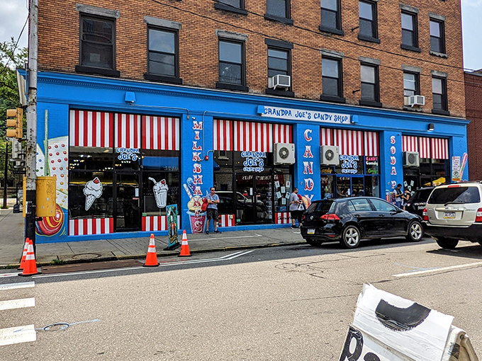 The candy-striped awnings and electric blue façade aren't just a storefront—they're a portal to your childhood. Pennsylvania's sweetest time machine awaits.