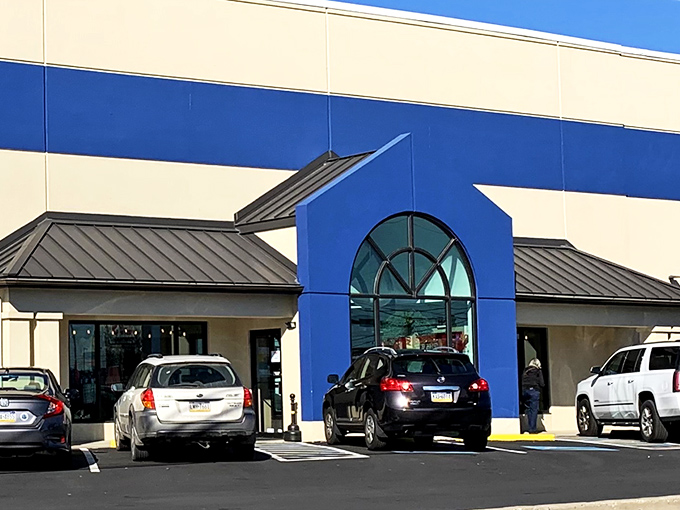 The distinctive purple and beige exterior welcomes treasure hunters with its arched window—like a portal to another shopping dimension.
