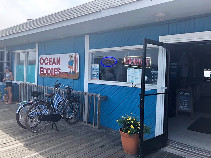 The cheerful blue exterior of Ocean Eddies welcomes seafood lovers like a maritime hug, complete with bicycles parked outside—transportation for locals who know where the good stuff is.