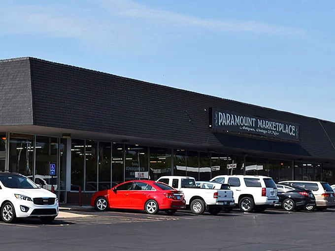 The unassuming exterior of Paramount Marketplace belies the wonderland within—like finding Narnia in a strip mall on East 13th Street.
