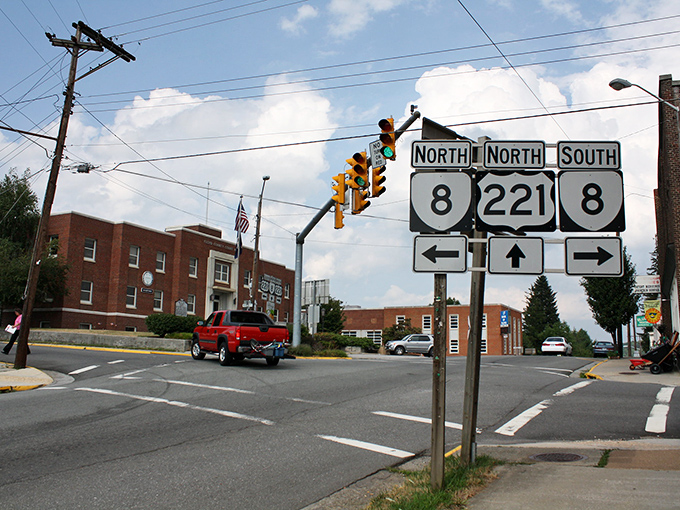 Main Street, Floyd – where the American flag waves proudly and one stoplight means you've arrived at Virginia's most charming small town secret.