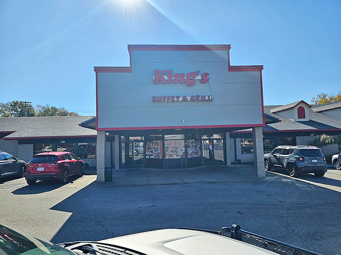 The unassuming exterior of King's Buffet & Grill hides a culinary wonderland within—like finding Narnia in a strip mall.