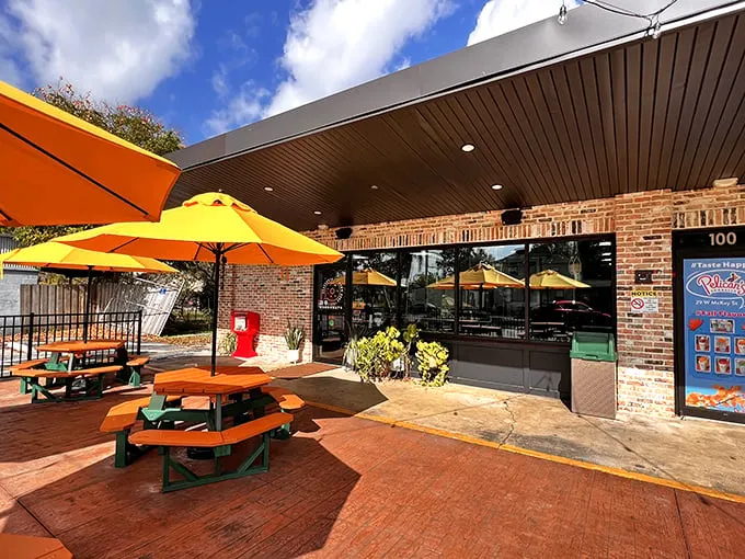 The sunshine-yellow umbrellas of DG Doughnuts beckon like beacons of hope in a world that desperately needs more frosting and joy.