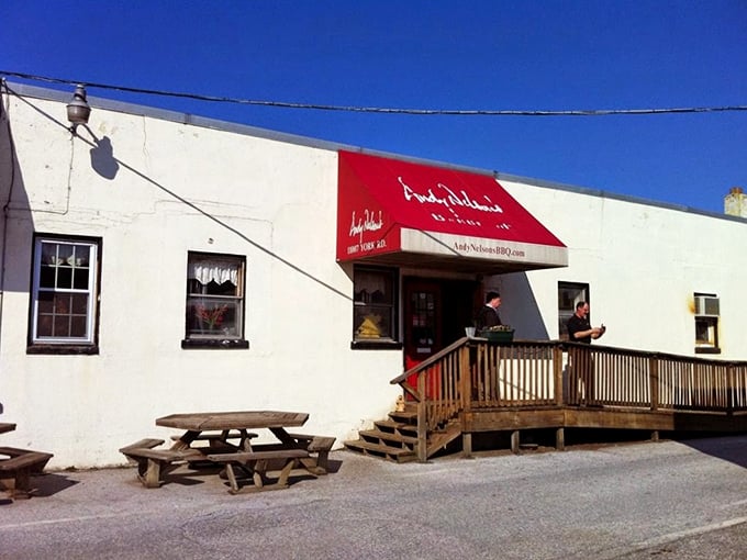 The unassuming exterior that houses barbecue greatness. Like finding a diamond in a strip mall, this place proves the best food often hides in plain sight.
