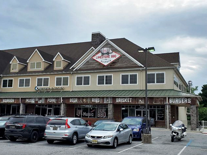 The rustic wooden façade of Limestone BBQ and Bourbon promises what every barbecue pilgrim seeks: a temple where smoke, meat, and time create magic.
