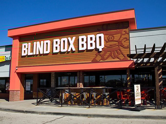 The bright orange facade of Blind Box BBQ stands out like a beacon for hungry barbecue pilgrims. No smoke signals needed—you can smell the goodness from the parking lot.