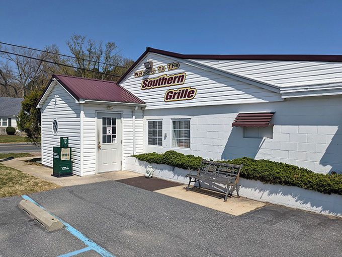 The unassuming white exterior of Southern Grille welcomes you like an old friend who doesn't need fancy clothes to prove their worth.