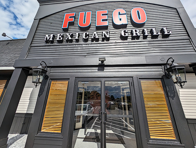 The understated exterior belies the flavor explosion waiting inside. Fuego's sleek black facade with bold red lettering makes a confident statement without the neon sombrero clichés. 