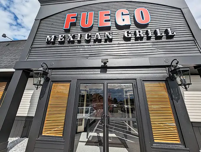The understated exterior belies the flavor explosion waiting inside. Fuego's sleek black facade with bold red lettering makes a confident statement without the neon sombrero clichés.