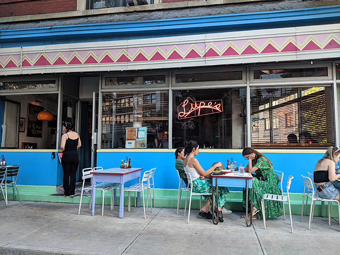 The blue storefront of Lupe's stands out on the corner like a colorful oasis in SoHo's urban landscape, beckoning hungry passersby with the promise of authentic Mexican flavors. 