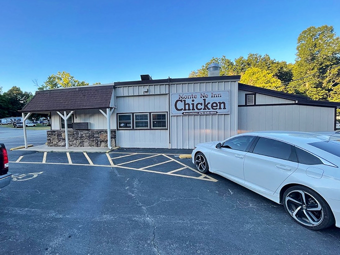 The unassuming exterior of Monte Ne Inn Chicken stands like a humble guardian of culinary treasures. No fancy frills, just the promise of legendary fried chicken within.
