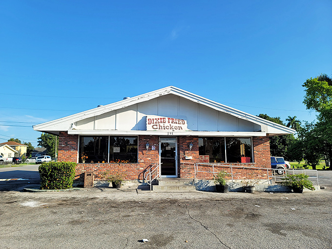 The unassuming brick exterior of Dixie Fried Chicken stands like a culinary lighthouse in Belle Glade, promising comfort food salvation to those in the know.
