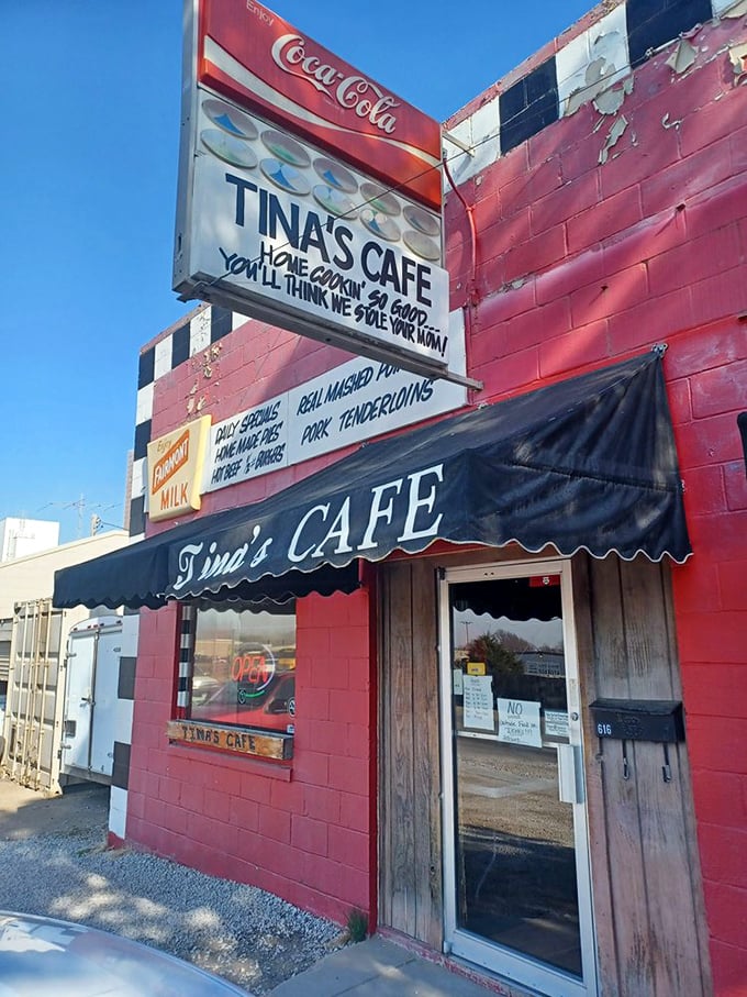 The checkered racing theme begins before you even walk in. This vibrant red building promises comfort food that'll have you waving the checkered flag of satisfaction.
