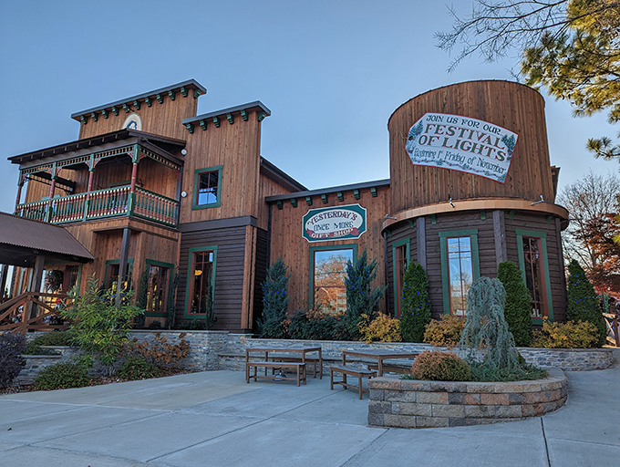 The rustic wooden exterior of Patti's 1880's Settlement welcomes visitors with its charming green trim—architectural comfort food for the soul.
