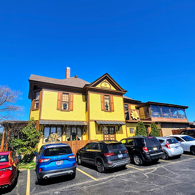 The Yellow Deli's historic façade welcomes you with stunning stone steps and vibrant gardens—like a Tennessee postcard come to life.