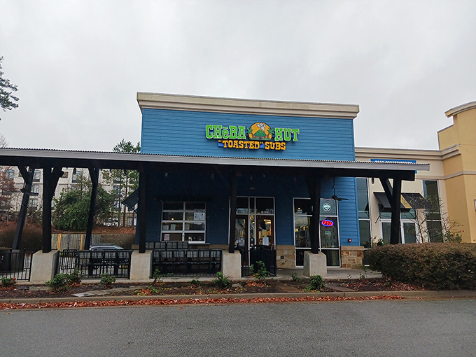 The bright blue exterior of Cheba Hut stands out like a sandwich oasis in Little Rock. "Toasted" isn't just a description—it's a promise.