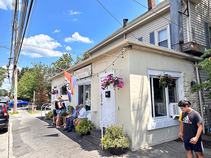 The unassuming exterior of Taqueria El Amigo might fool you, but that "TACOS" flag is actually the culinary equivalent of "Treasure Found Here!"
